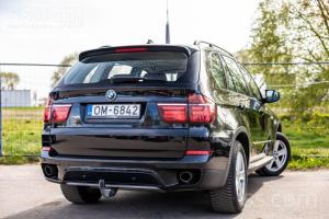 Black BMW X5 2010 in Riga, with an engine capacity of 3.00 L and mileage of 310 thousand km for 12990 €, photo 8 on AUTOMOTO.COM.LV