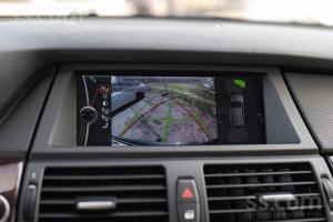 Black BMW X5 2010 in Riga, with an engine capacity of 3.00 L and mileage of 310 thousand km for 12990 €, photo 24 on AUTOMOTO.COM.LV