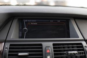 Black BMW X5 2010 in Riga, with an engine capacity of 3.00 L and mileage of 310 thousand km for 12990 €, photo 25 on AUTOMOTO.COM.LV