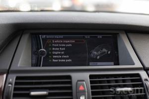 Black BMW X5 2010 in Riga, with an engine capacity of 3.00 L and mileage of 310 thousand km for 12990 €, photo 26 on AUTOMOTO.COM.LV