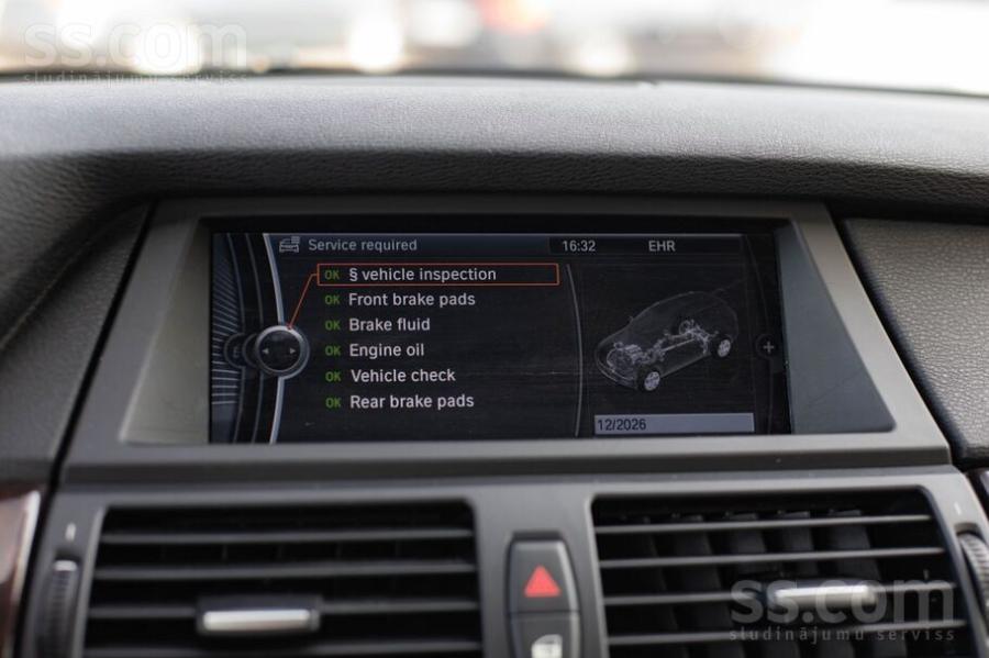 Black BMW X5 2010 in Riga, with an engine capacity of 3.00 L and mileage of 310 thousand km for 12990 €, photo 26 on AUTOMOTO.COM.LV
