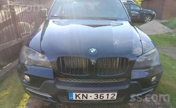 Black BMW X5 2010 in Riga, with an engine capacity of 3.00 L and mileage of 257 thousand km for 10650 €, photo 3 on AUTOMOTO.COM.LV