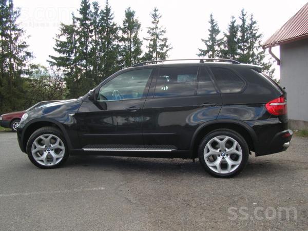 Black BMW X5 2010 in Riga, with an engine capacity of 3.00 L and mileage of 0 thousand km for 11950 €, photo 4 on AUTOMOTO.COM.LV