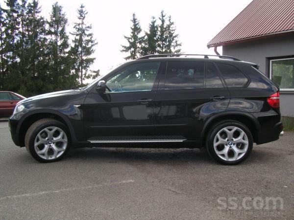Black BMW X5 2010 in Riga, with an engine capacity of 3.00 L and mileage of 0 thousand km for 11950 €, photo 8 on AUTOMOTO.COM.LV