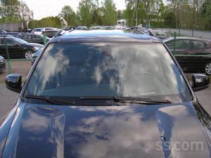 Black BMW X5 2010 in Riga, with an engine capacity of 3.00 L and mileage of 0 thousand km for 11950 €, photo 13 on AUTOMOTO.COM.LV