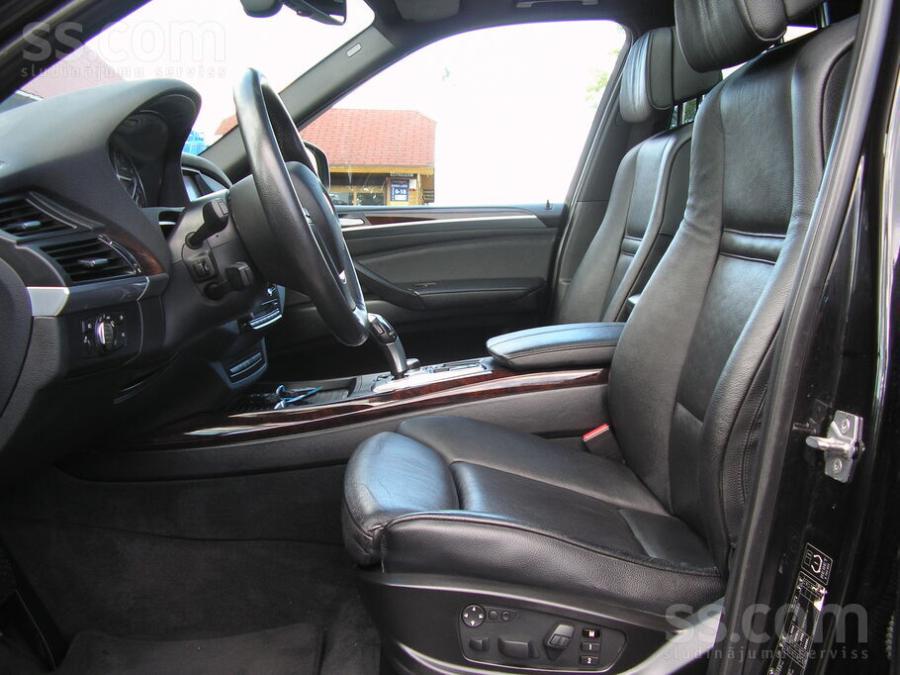 Black BMW X5 2010 in Riga, with an engine capacity of 3.00 L and mileage of 0 thousand km for 11950 €, photo 21 on AUTOMOTO.COM.LV