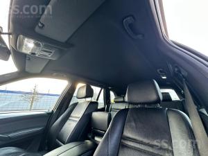 Melns BMW X5 2010 Rīga, ar dzinēja tilpumu 3.00 L un nobraukumu 324 tūkst. km par 10500 €, foto 24 vietnē AUTOMOTO.COM.LV
