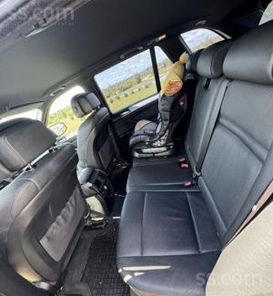 Black BMW X5 2010 in Riga, with an engine capacity of 3.00 L and mileage of 324 thousand km for 8799 €, photo 15 on AUTOMOTO.COM.LV