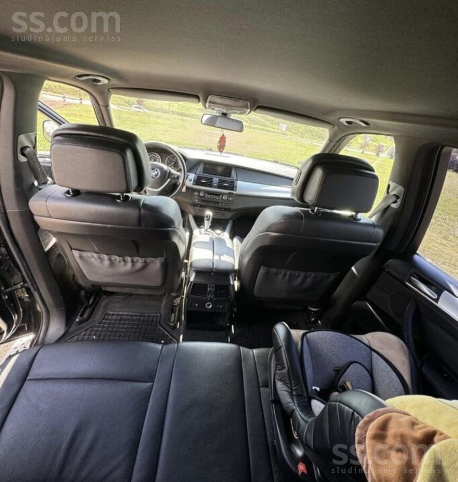 Black BMW X5 2010 in Riga, with an engine capacity of 3.00 L and mileage of 324 thousand km for 8799 €, photo 16 on AUTOMOTO.COM.LV