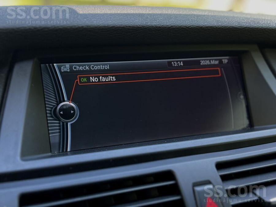 Black BMW X5 2010 in Ventspils, with an engine capacity of 3.00 L and mileage of 290 thousand km for 9995 €, photo 20 on AUTOMOTO.COM.LV