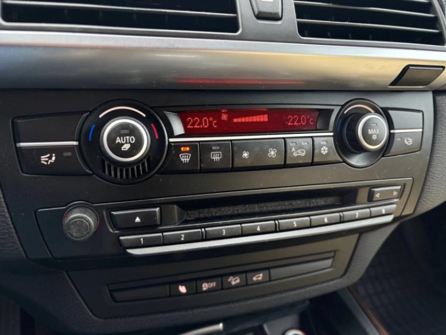 Black BMW X5 2010 in Riga, with an engine capacity of 3.00 L and mileage of 245 thousand km for 11999 €, photo 12 on AUTOMOTO.COM.LV