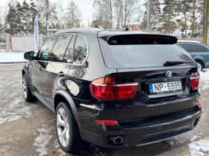 Black BMW X5 2010 in Riga, with an engine capacity of 3.00 L and mileage of 245 thousand km for 11999 €, photo 20 on AUTOMOTO.COM.LV