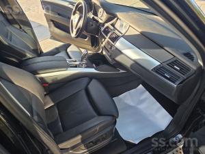 Black BMW X5 2010 in Riga, with an engine capacity of 3.00 L and mileage of 236 thousand km for 11000 €, photo 12 on AUTOMOTO.COM.LV