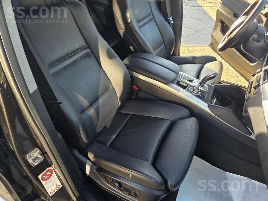 Black BMW X5 2010 in Riga, with an engine capacity of 3.00 L and mileage of 236 thousand km for 11000 €, photo 13 on AUTOMOTO.COM.LV