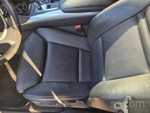 Black BMW X5 2010 in Riga, with an engine capacity of 3.00 L and mileage of 236 thousand km for 11000 €, photo 17 on AUTOMOTO.COM.LV