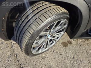 Black BMW X5 2010 in Riga, with an engine capacity of 3.00 L and mileage of 236 thousand km for 11000 €, photo 18 on AUTOMOTO.COM.LV