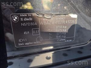 Black BMW X5 2010 in Riga, with an engine capacity of 3.00 L and mileage of 236 thousand km for 11000 €, photo 21 on AUTOMOTO.COM.LV