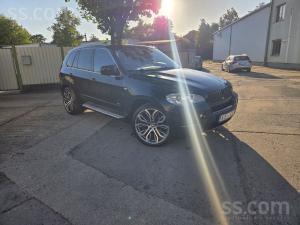 Black BMW X5 2010 in Riga, with an engine capacity of 3.00 L and mileage of 236 thousand km for 11000 €, photo 22 on AUTOMOTO.COM.LV