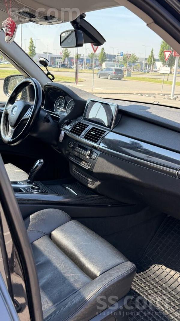 Melns BMW X5 2010 Rīga, ar dzinēja tilpumu 3.00 L un nobraukumu 442 tūkst. km par 11300 €, foto 8 vietnē AUTOMOTO.COM.LV