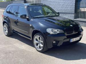 Black BMW X5 2010 in Marijampole, with an engine capacity of 3.00 L and mileage of 204 thousand km for 11950 €, photo  on AUTOMOTO.COM.LV