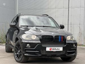 Black BMW X5 2010 in Utena, with an engine capacity of 2.99 L and mileage of 335 thousand km for 8950 €, photo 5 on AUTOMOTO.COM.LV