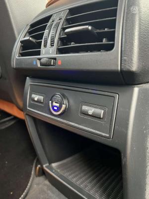 Black BMW X5 2010 in Utena, with an engine capacity of 2.99 L and mileage of 335 thousand km for 8950 €, photo 31 on AUTOMOTO.COM.LV