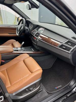 Black BMW X5 2010 in Utena, with an engine capacity of 2.99 L and mileage of 335 thousand km for 8950 €, photo 39 on AUTOMOTO.COM.LV