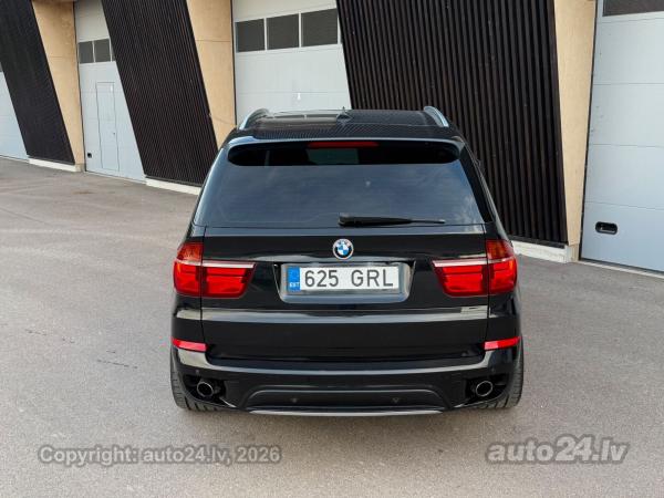 Black BMW X5 2010 in Tartu, with an engine capacity of 3.00 L and mileage of 390 thousand km for 8999 €, photo 6 on AUTOMOTO.COM.LV