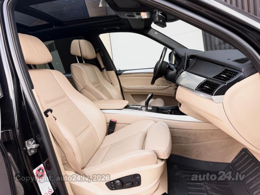 Melns BMW X5 2010 Tartu, ar dzinēja tilpumu 3.00 L un nobraukumu 390 tūkst. km par 8999 €, foto 10 vietnē AUTOMOTO.COM.LV