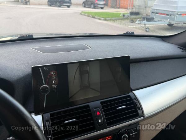 Black BMW X5 2010 in Tartu, with an engine capacity of 3.00 L and mileage of 390 thousand km for 8999 €, photo 10 on AUTOMOTO.COM.LV
