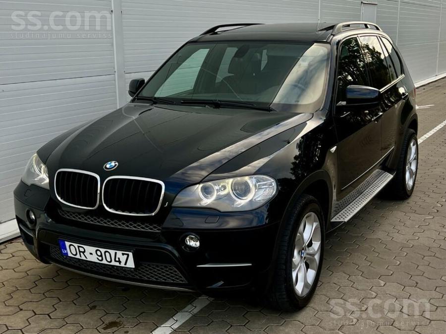 Black BMW X5 2010 in Riga, with an engine capacity of 3.00 L and mileage of 176 thousand km for 13500 €, photo 7 on AUTOMOTO.COM.LV