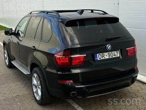 Black BMW X5 2010 in Riga, with an engine capacity of 3.00 L and mileage of 176 thousand km for 13500 €, photo 11 on AUTOMOTO.COM.LV