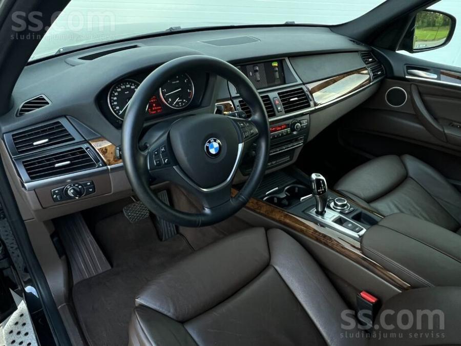 Black BMW X5 2010 in Riga, with an engine capacity of 3.00 L and mileage of 176 thousand km for 13500 €, photo 14 on AUTOMOTO.COM.LV