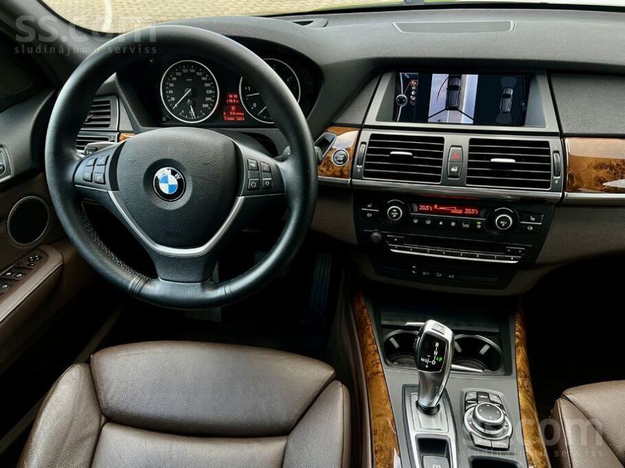Black BMW X5 2010 in Riga, with an engine capacity of 3.00 L and mileage of 176 thousand km for 13500 €, photo 19 on AUTOMOTO.COM.LV