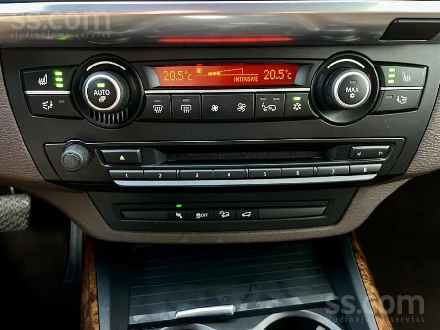 Black BMW X5 2010 in Riga, with an engine capacity of 3.00 L and mileage of 176 thousand km for 13500 €, photo 24 on AUTOMOTO.COM.LV
