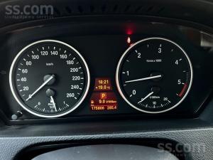 Black BMW X5 2010 in Riga, with an engine capacity of 3.00 L and mileage of 176 thousand km for 13500 €, photo 27 on AUTOMOTO.COM.LV