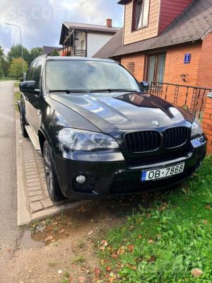 Melns BMW X5 2010 Preiļi, ar dzinēja tilpumu 3.00 L un nobraukumu 323 tūkst. km par 11500 €, foto  vietnē AUTOMOTO.COM.LV