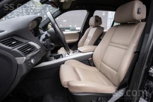 Black BMW X5 2010 in Jelgava, with an engine capacity of 3.00 L and mileage of 263 thousand km for 9450 €, photo 17 on AUTOMOTO.COM.LV