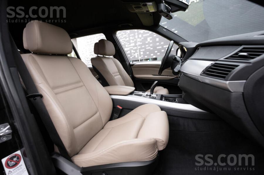 Black BMW X5 2010 in Jelgava, with an engine capacity of 3.00 L and mileage of 263 thousand km for 9450 €, photo 20 on AUTOMOTO.COM.LV