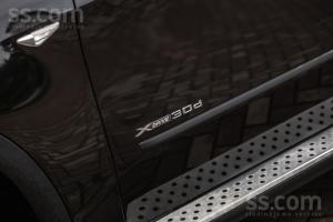 Black BMW X5 2010 in Jelgava, with an engine capacity of 3.00 L and mileage of 263 thousand km for 9450 €, photo 27 on AUTOMOTO.COM.LV