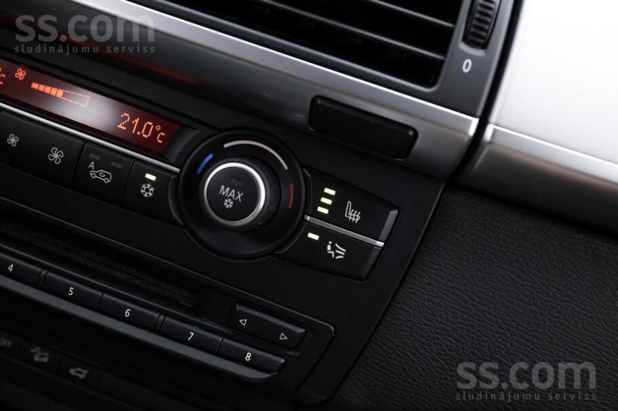 Black BMW X5 2010 in Jelgava, with an engine capacity of 3.00 L and mileage of 263 thousand km for 9450 €, photo 31 on AUTOMOTO.COM.LV