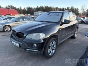 Black BMW X5 2010 in Riga, with an engine capacity of 3.00 L and mileage of 396 thousand km for 5900 €, photo  on AUTOMOTO.COM.LV