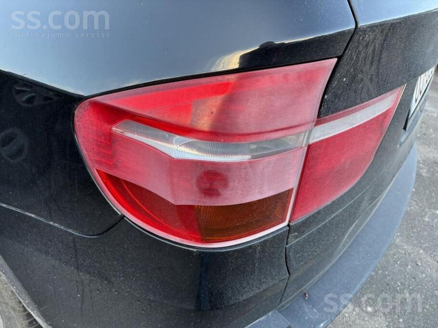 Black BMW X5 2010 in Riga, with an engine capacity of 3.00 L and mileage of 396 thousand km for 5900 €, photo 8 on AUTOMOTO.COM.LV