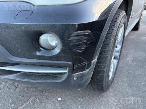 Black BMW X5 2010 in Riga, with an engine capacity of 3.00 L and mileage of 396 thousand km for 5900 €, photo 10 on AUTOMOTO.COM.LV