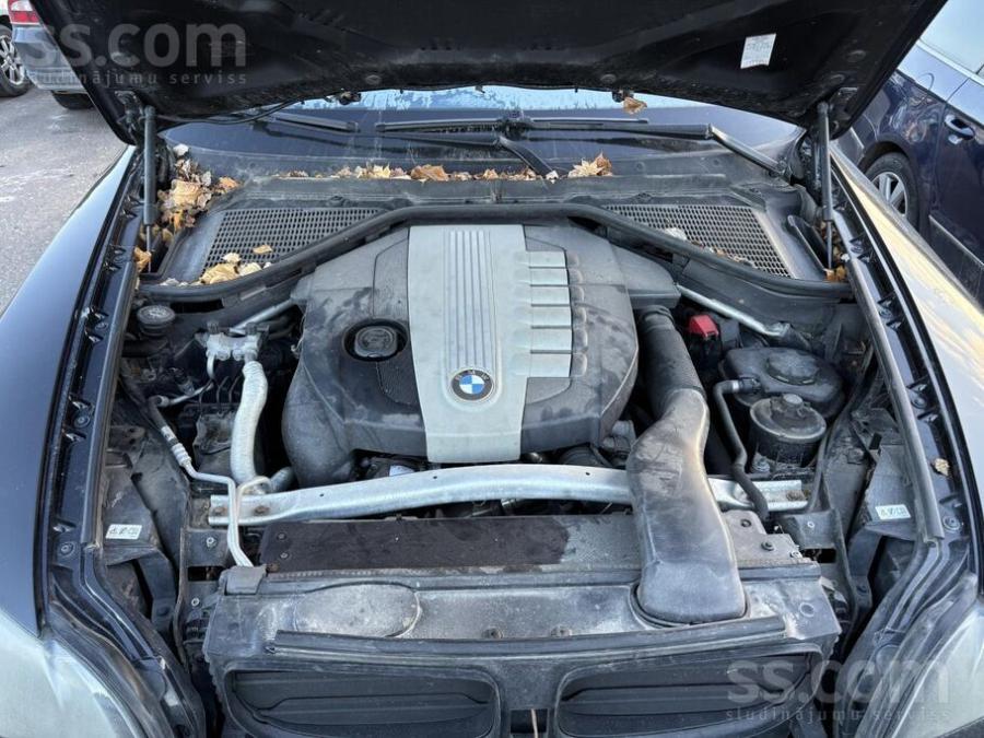 Black BMW X5 2010 in Riga, with an engine capacity of 3.00 L and mileage of 396 thousand km for 5900 €, photo 11 on AUTOMOTO.COM.LV