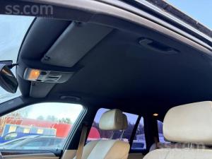 Black BMW X5 2010 in Riga, with an engine capacity of 3.00 L and mileage of 396 thousand km for 5900 €, photo 15 on AUTOMOTO.COM.LV