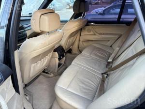 Black BMW X5 2010 in Riga, with an engine capacity of 3.00 L and mileage of 396 thousand km for 5900 €, photo 16 on AUTOMOTO.COM.LV