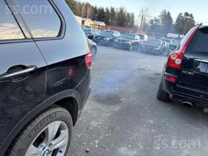 Black BMW X5 2010 in Riga, with an engine capacity of 3.00 L and mileage of 396 thousand km for 5900 €, photo 20 on AUTOMOTO.COM.LV