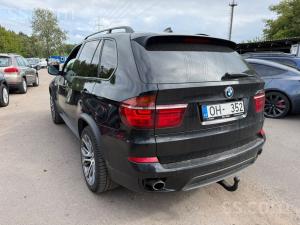 Black BMW X5 2010 in Riga, with an engine capacity of 3.00 L and mileage of 270 thousand km for 7790 €, photo 6 on AUTOMOTO.COM.LV