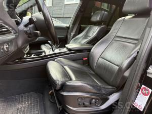 Black BMW X5 2010 in Riga, with an engine capacity of 3.00 L and mileage of 270 thousand km for 7790 €, photo 10 on AUTOMOTO.COM.LV